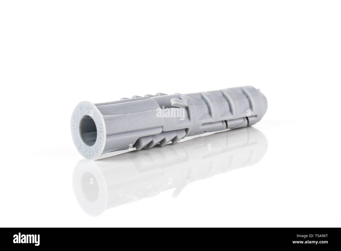 Closeup of one whole plastic light grey wall plug work item isolated on ...