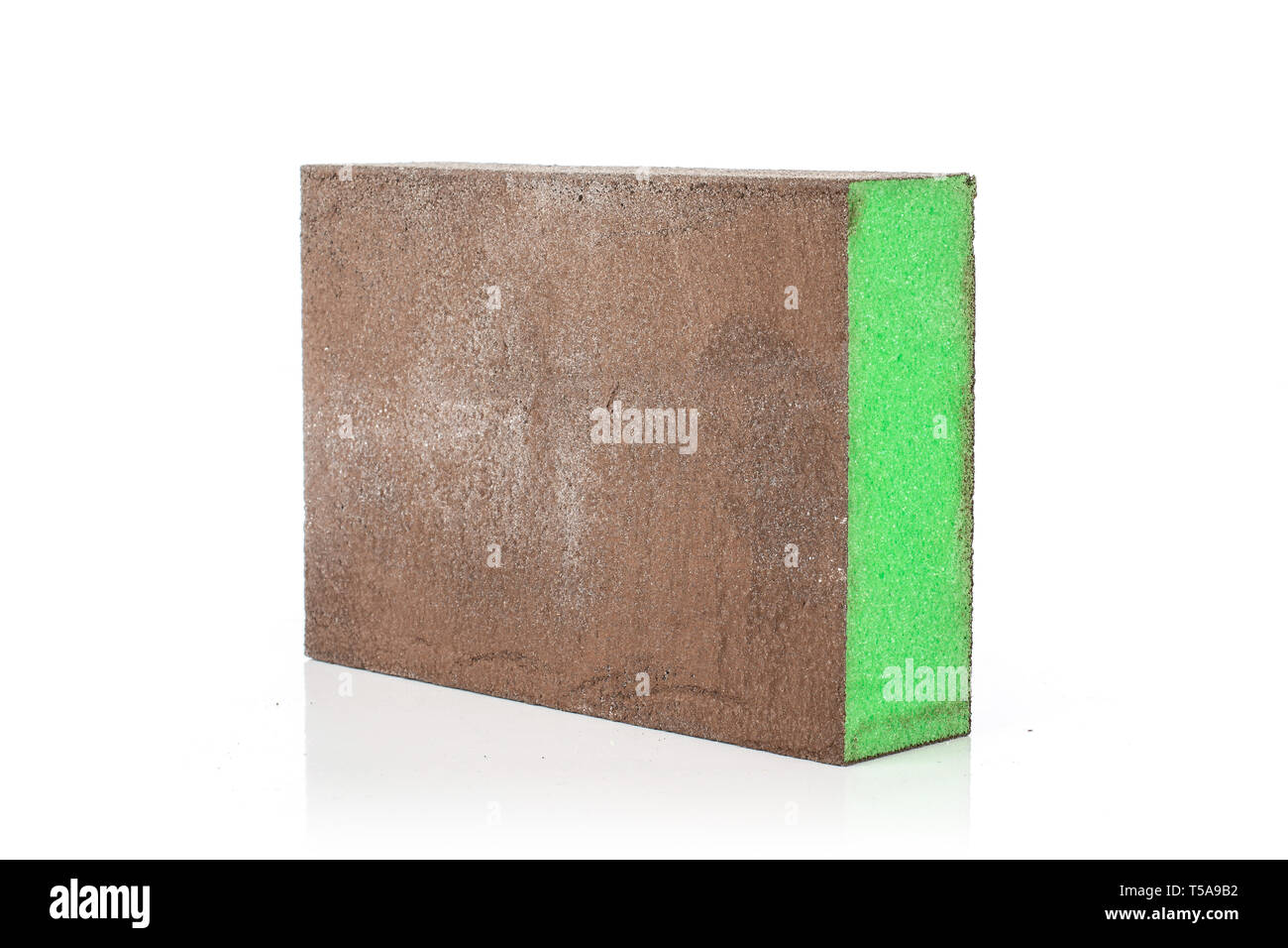 One whole green brown abrasive block sponge work item isolated on white ...