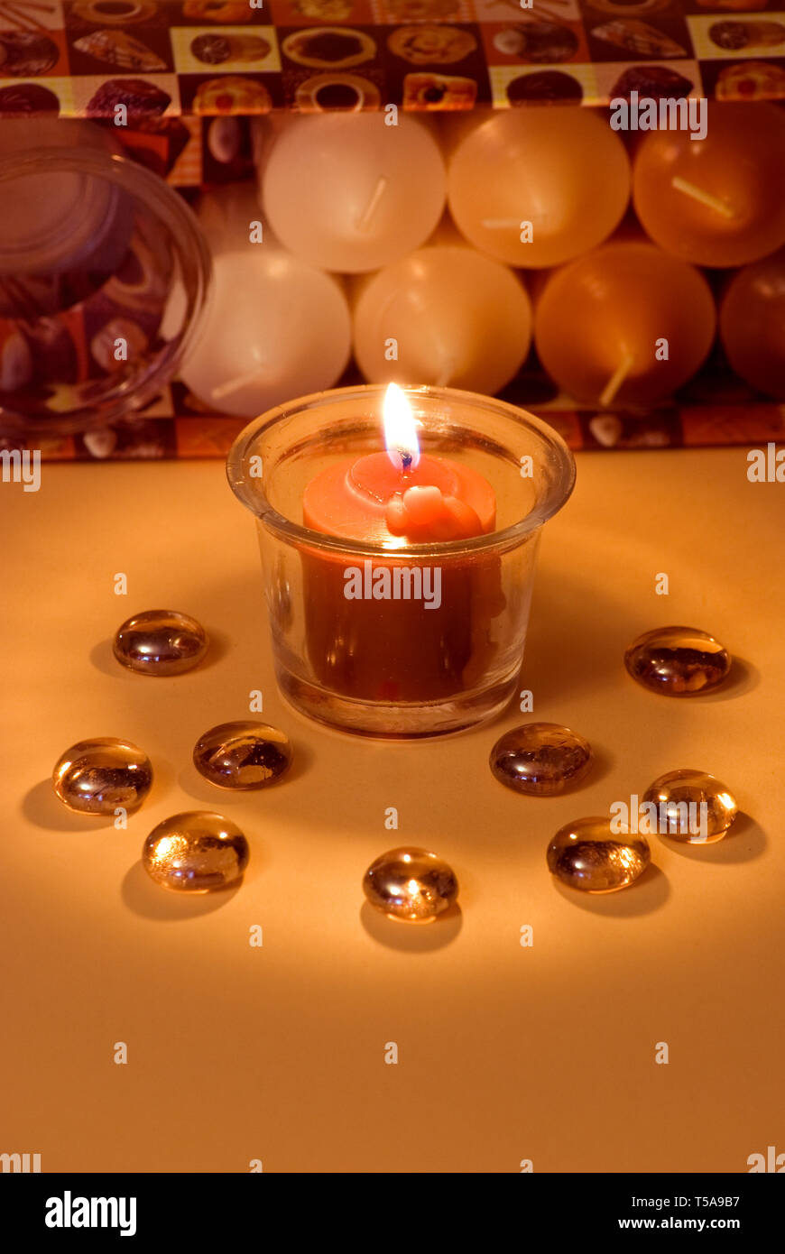 Candles with different objects Stock Photo - Alamy
