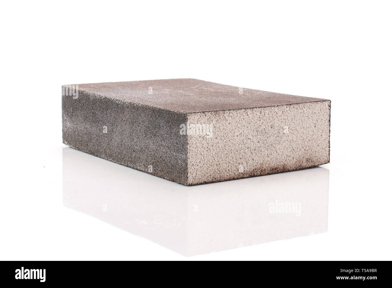 One whole grey abrasive sponge work item isolated on white background ...