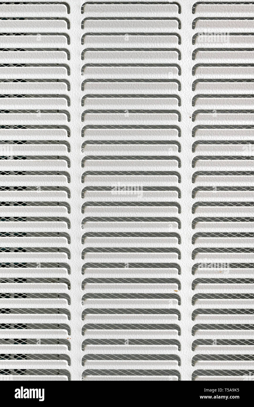 Slotted metal plate pattern as background, texture of white metallic ...