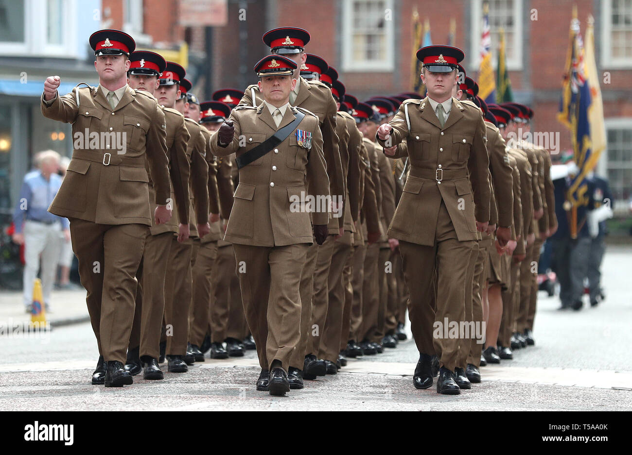 Soldiers from the 16th Regiment Royal Artillery march along the High street during the annual St ...