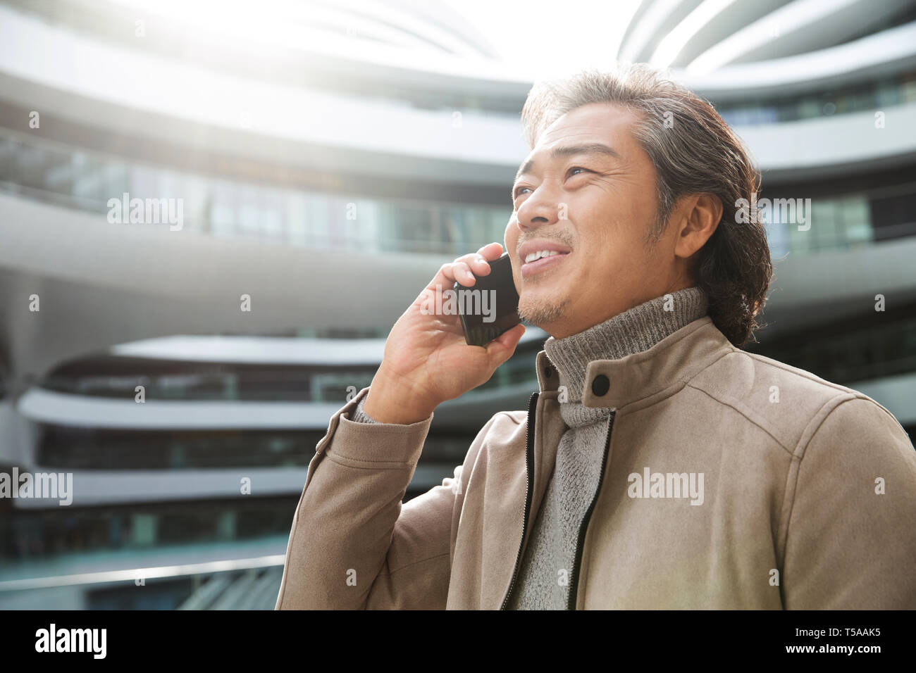 Business man make a phone call Stock Photo - Alamy