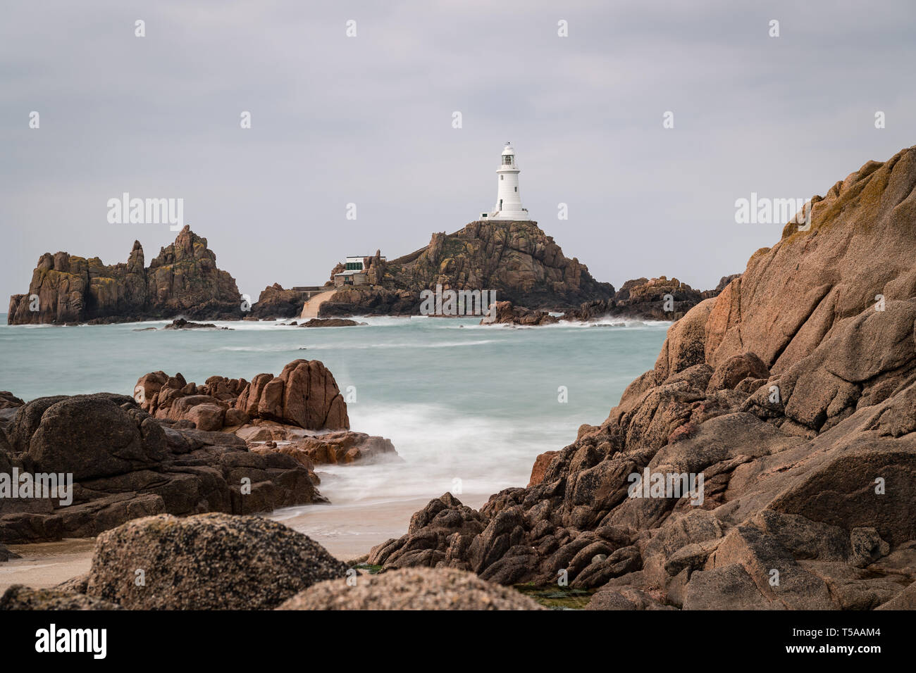 La Corbiere Lighthouse at high tide, Jersey, Channel Islands Stock ...