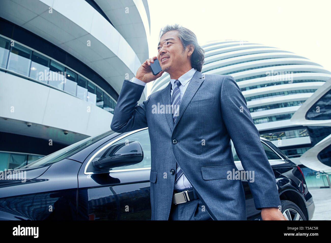 Business man make a phone call Stock Photo - Alamy