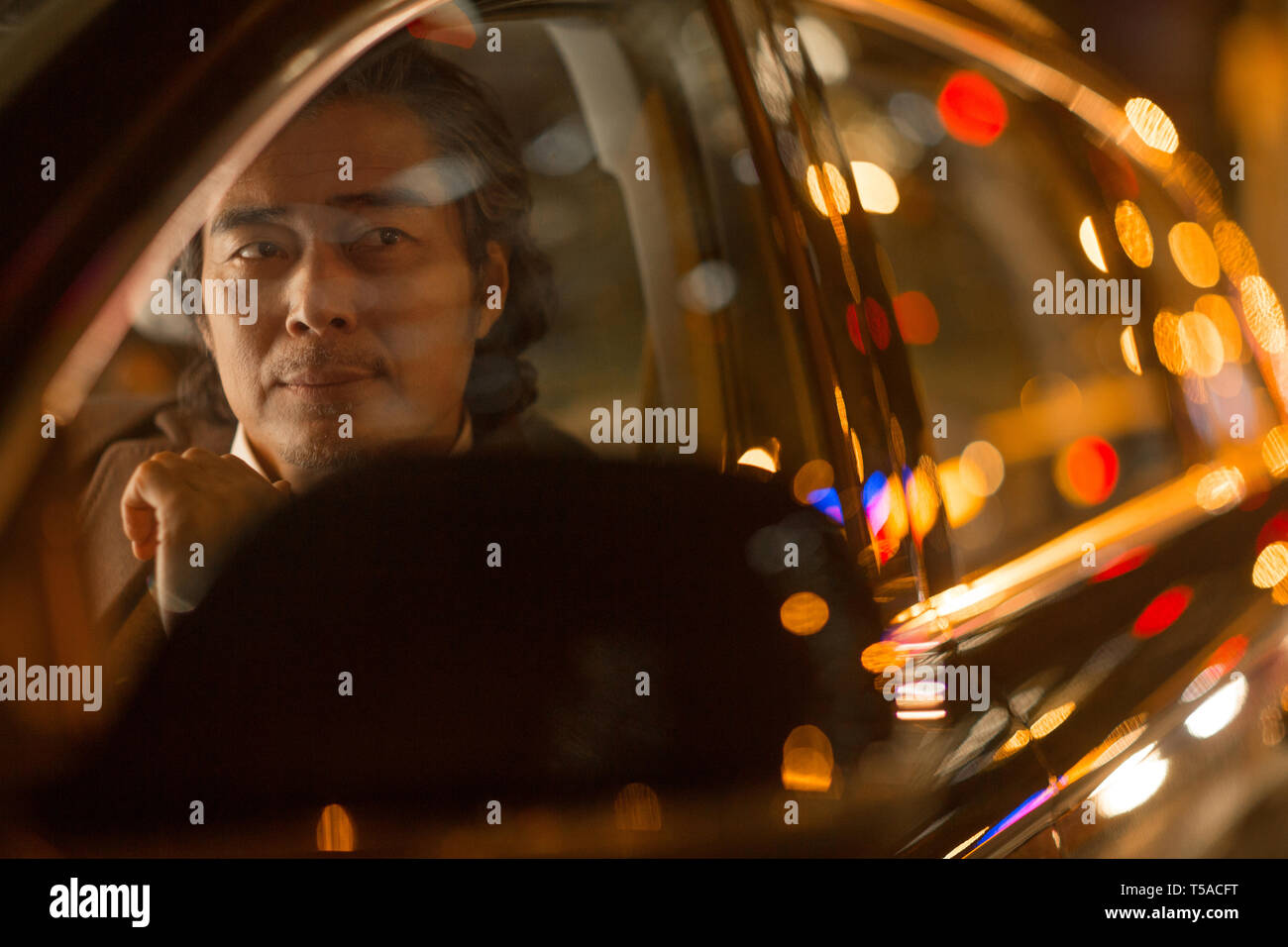 Asian businessman driving car hi-res stock photography and images - Alamy