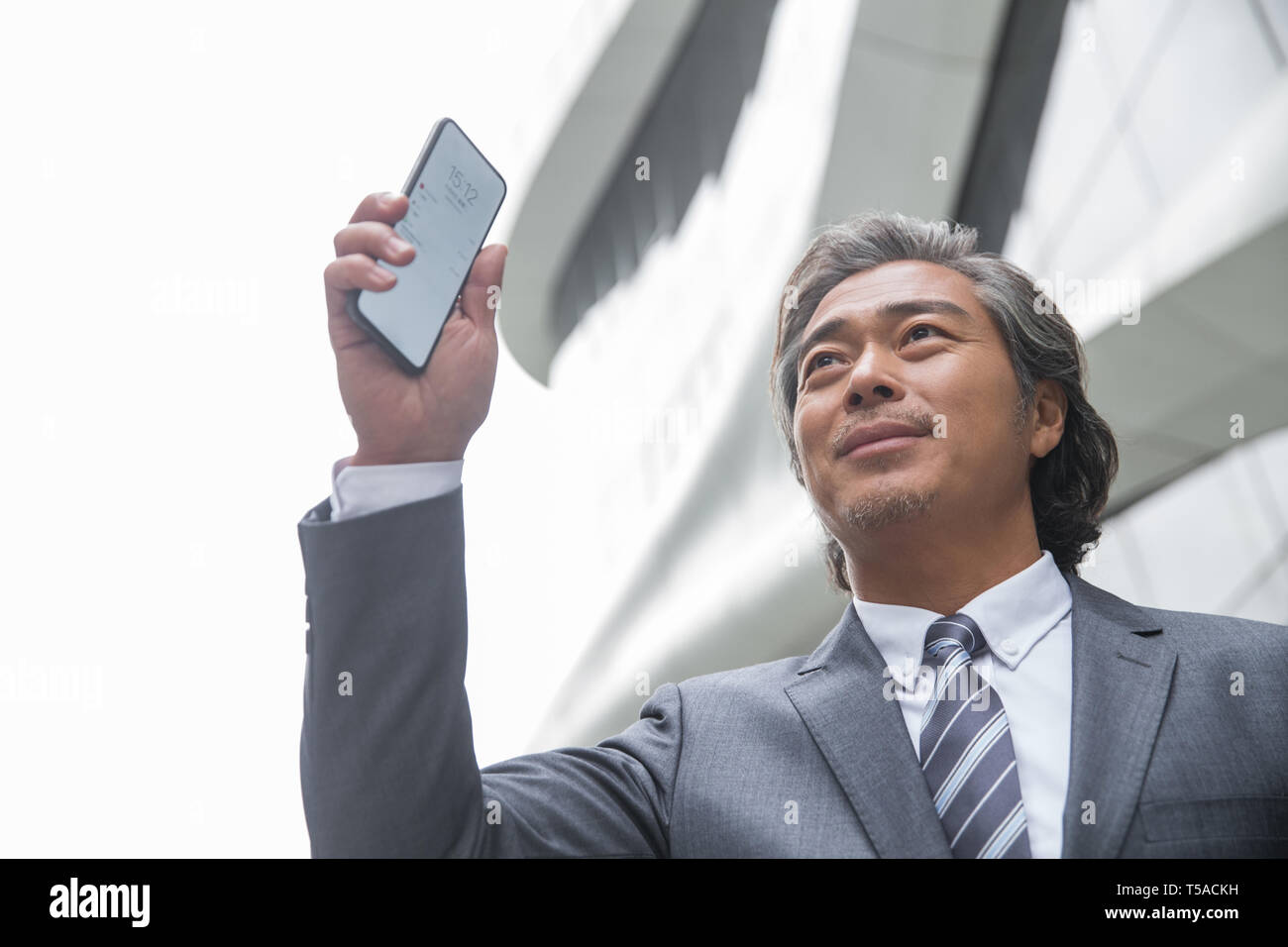 Business man make a phone call Stock Photo - Alamy