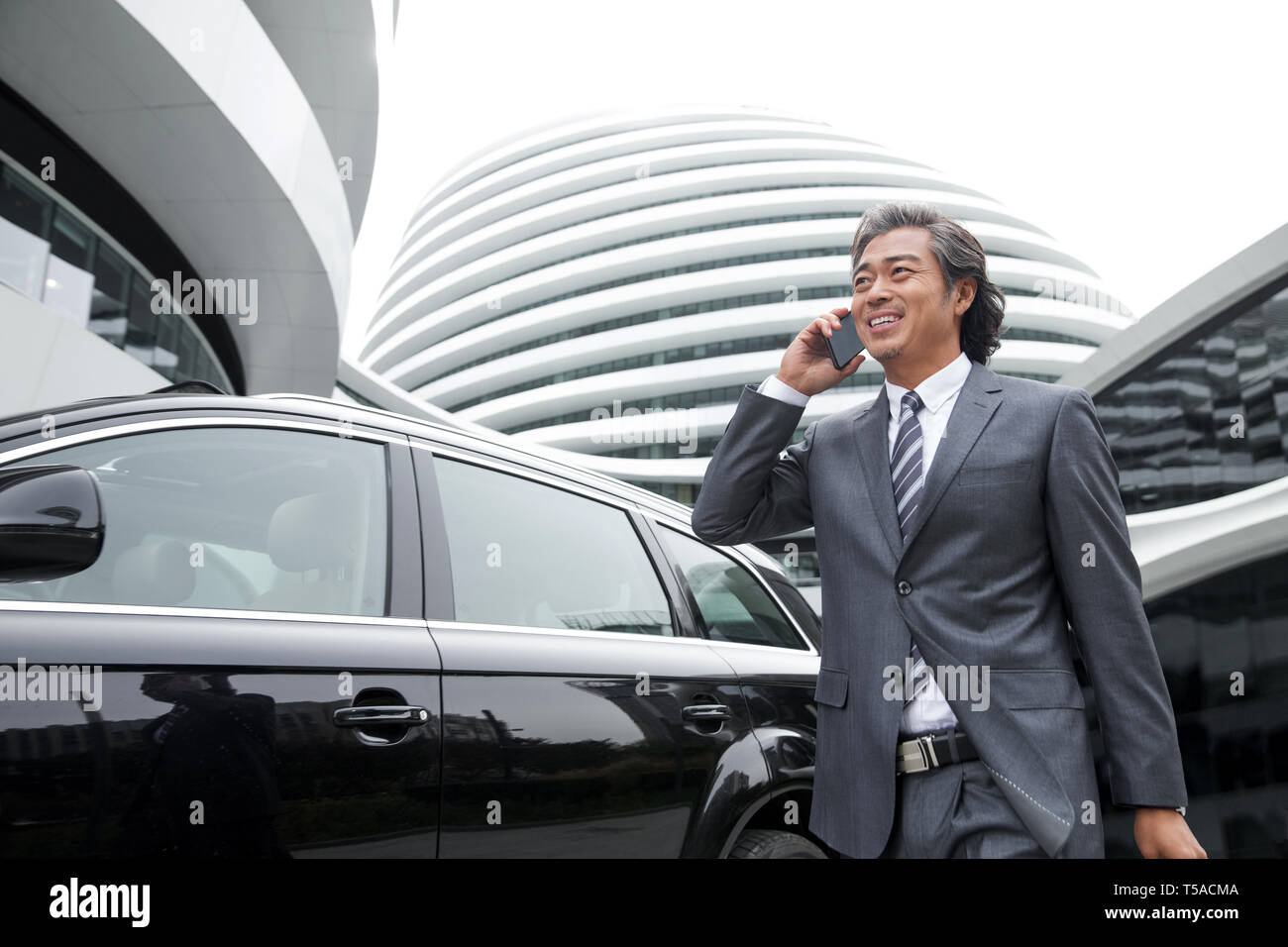 Business man make a phone call Stock Photo - Alamy