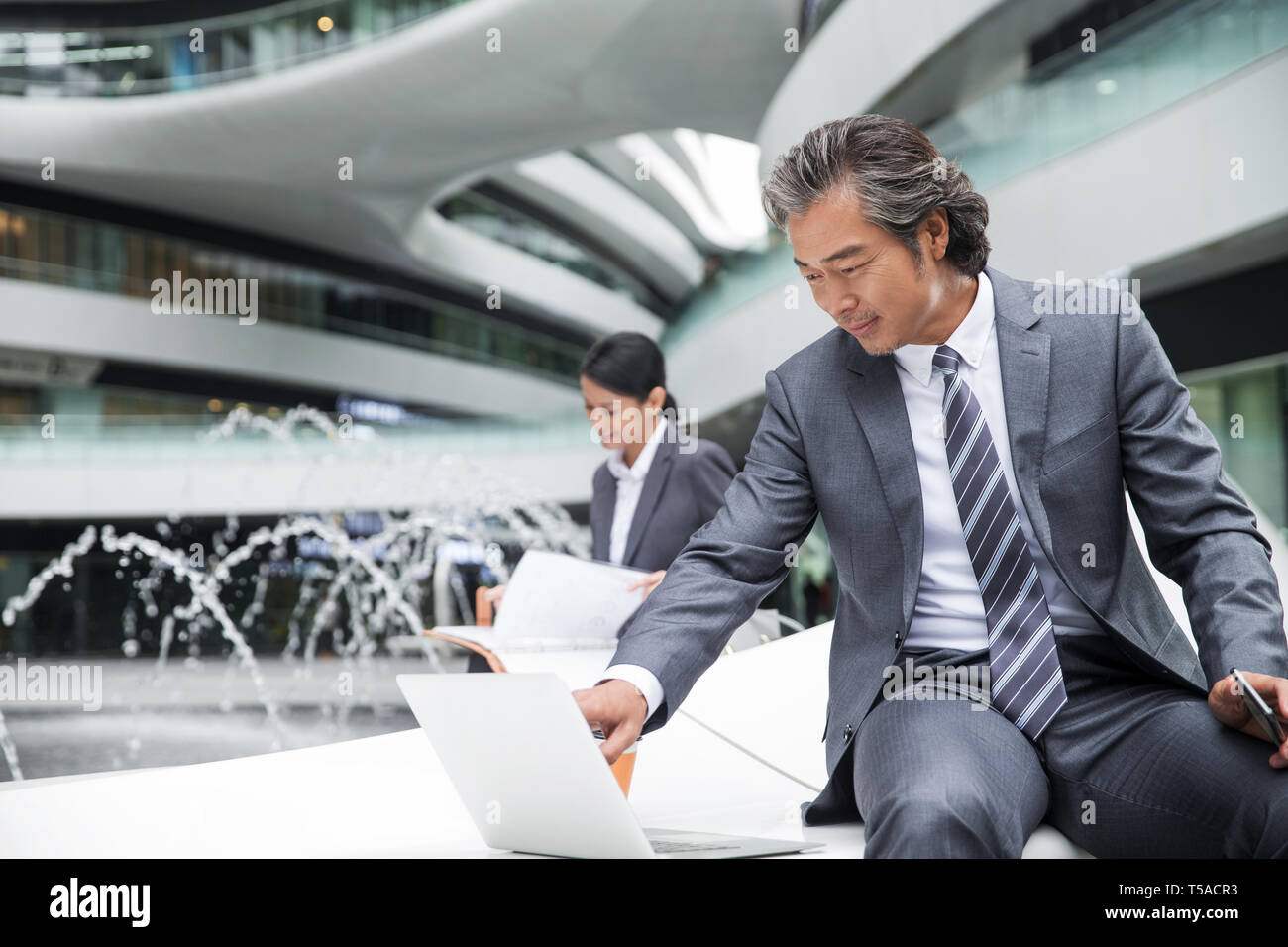 Business people outside the office Stock Photo - Alamy