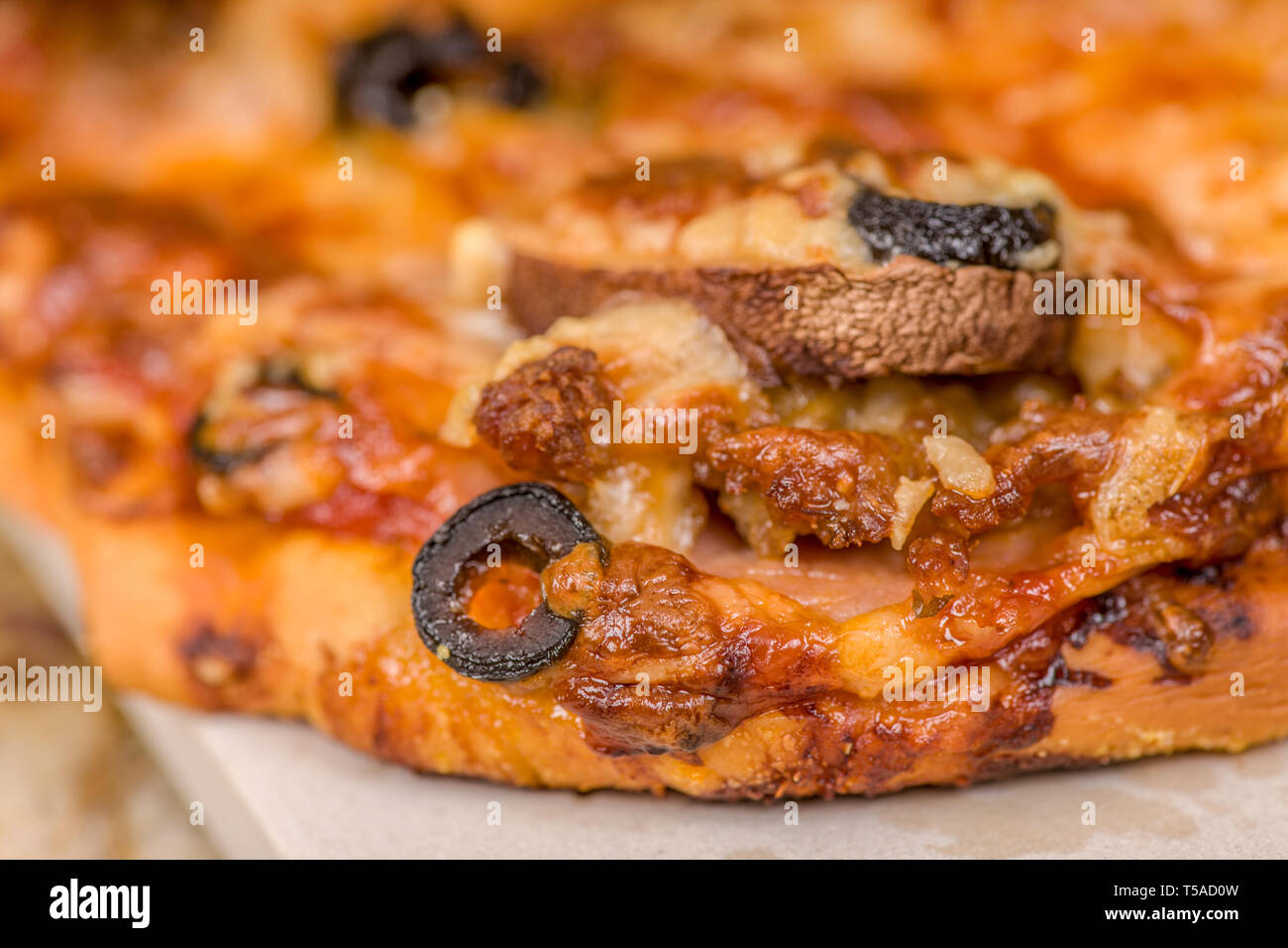 Homemade meat and veggie pizza with toppings of sausage, pepperoni ...