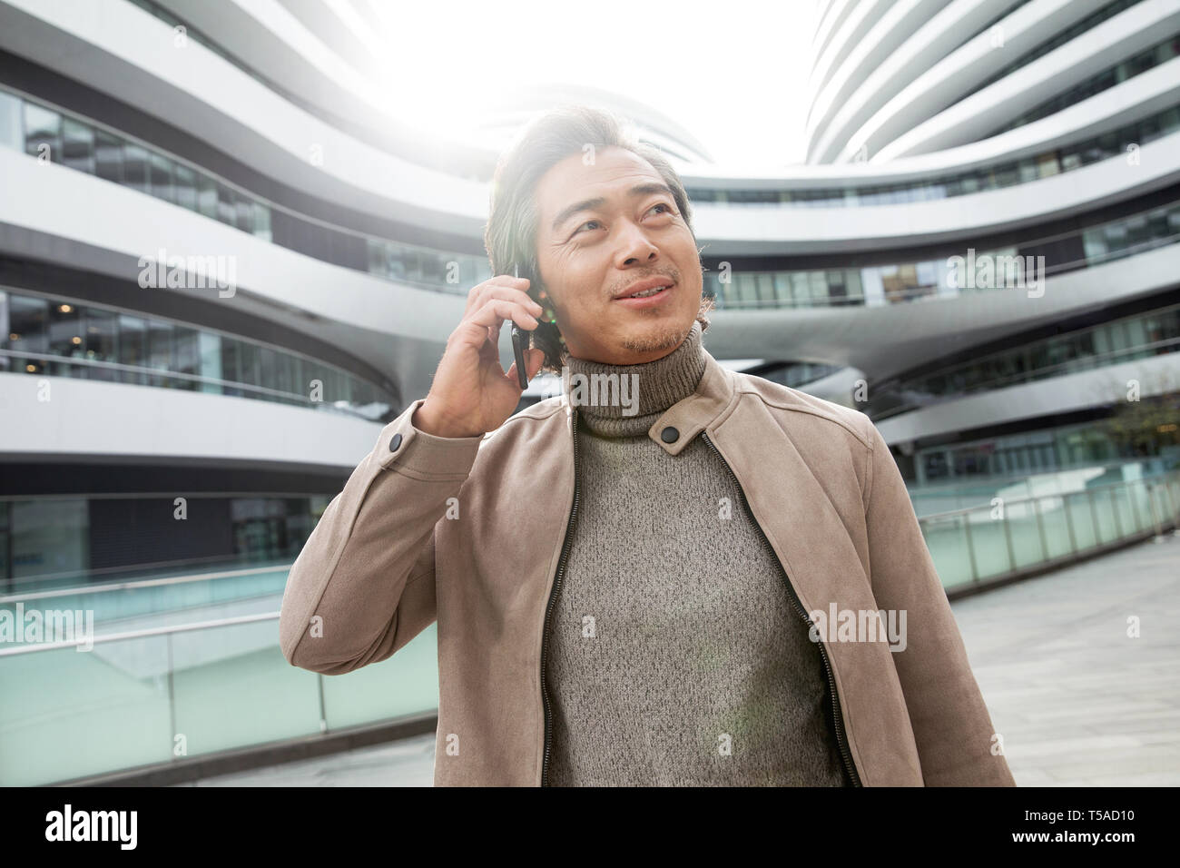 Business man make a phone call Stock Photo - Alamy