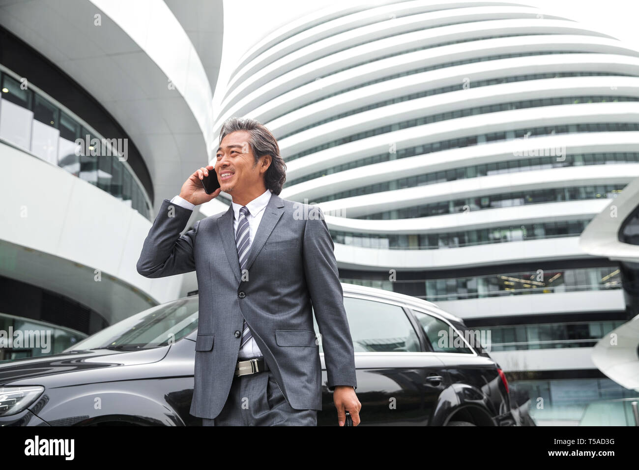 Business man make a phone call Stock Photo - Alamy
