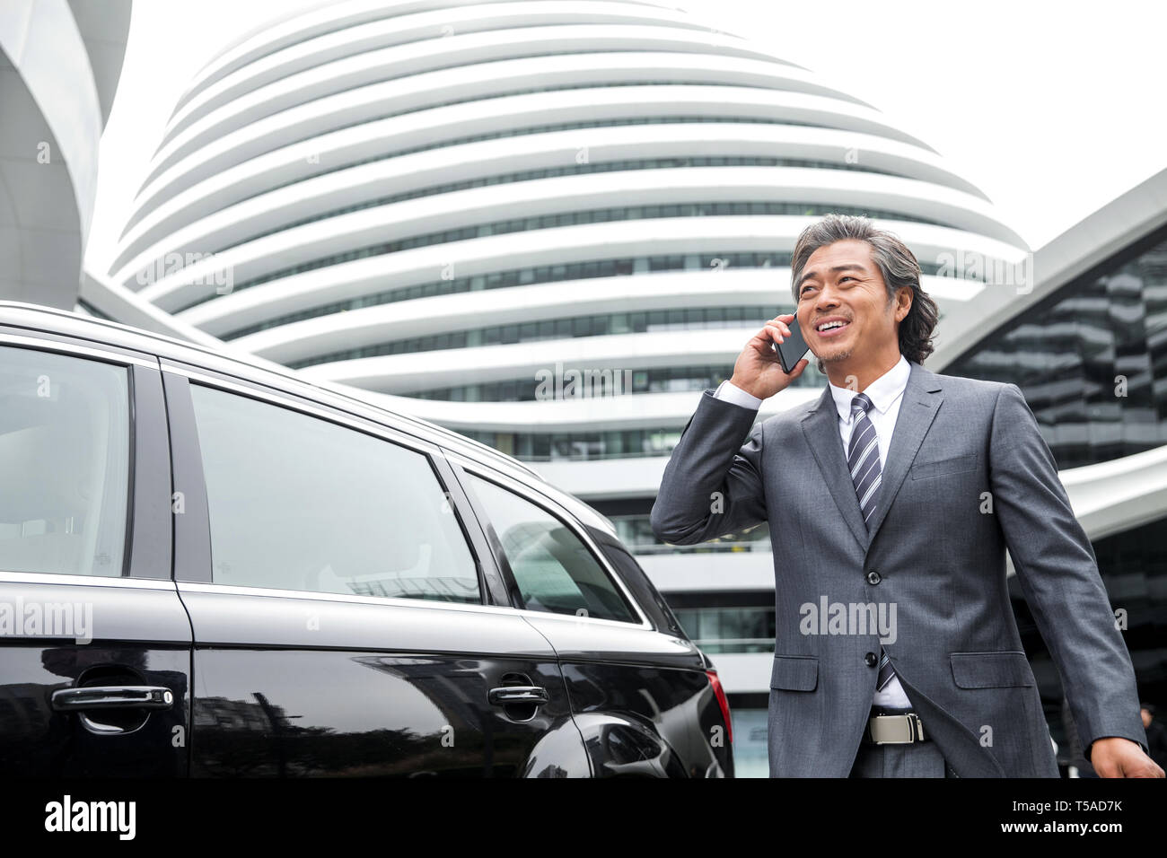 Business man make a phone call Stock Photo - Alamy