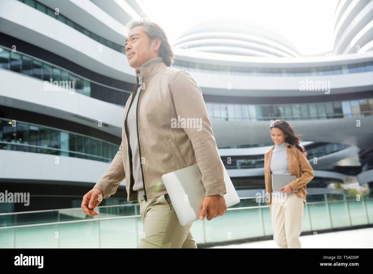 Walking looking away authority street confidence hi-res stock photography and images - Alamy