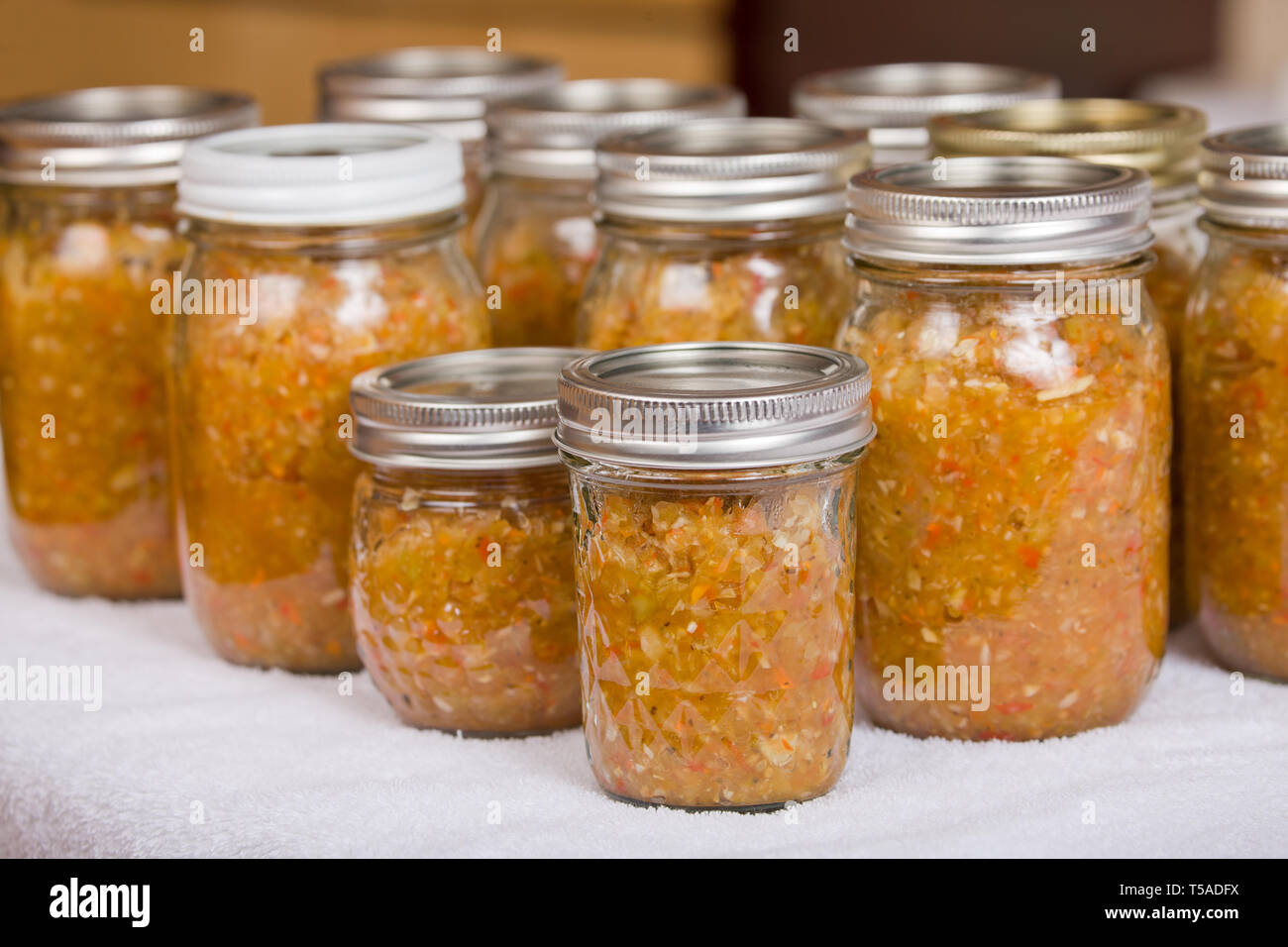 Group of relish jars of various sizes, ready to be par-boiled Stock ...