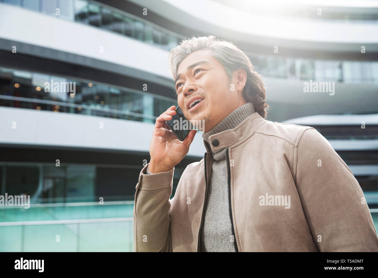 Business man make a phone call Stock Photo - Alamy