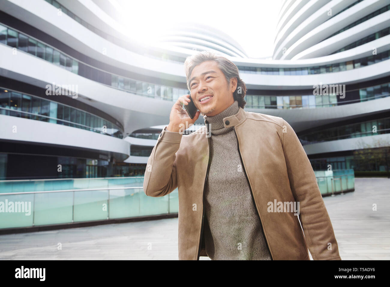 Business man make a phone call Stock Photo - Alamy