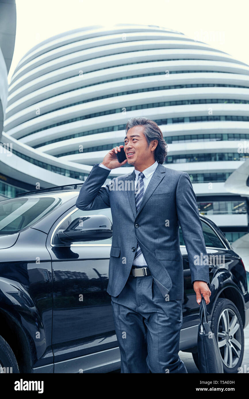 Business man make a phone call Stock Photo - Alamy