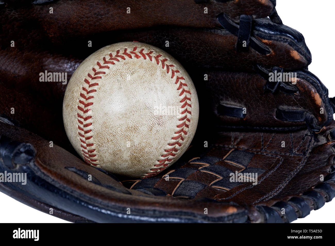 Close up of Used baseball and baseball glove isolated on white Stock ...