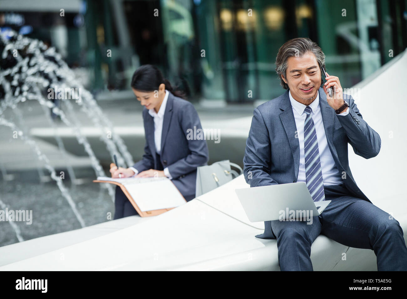 Business people outside the office Stock Photo - Alamy