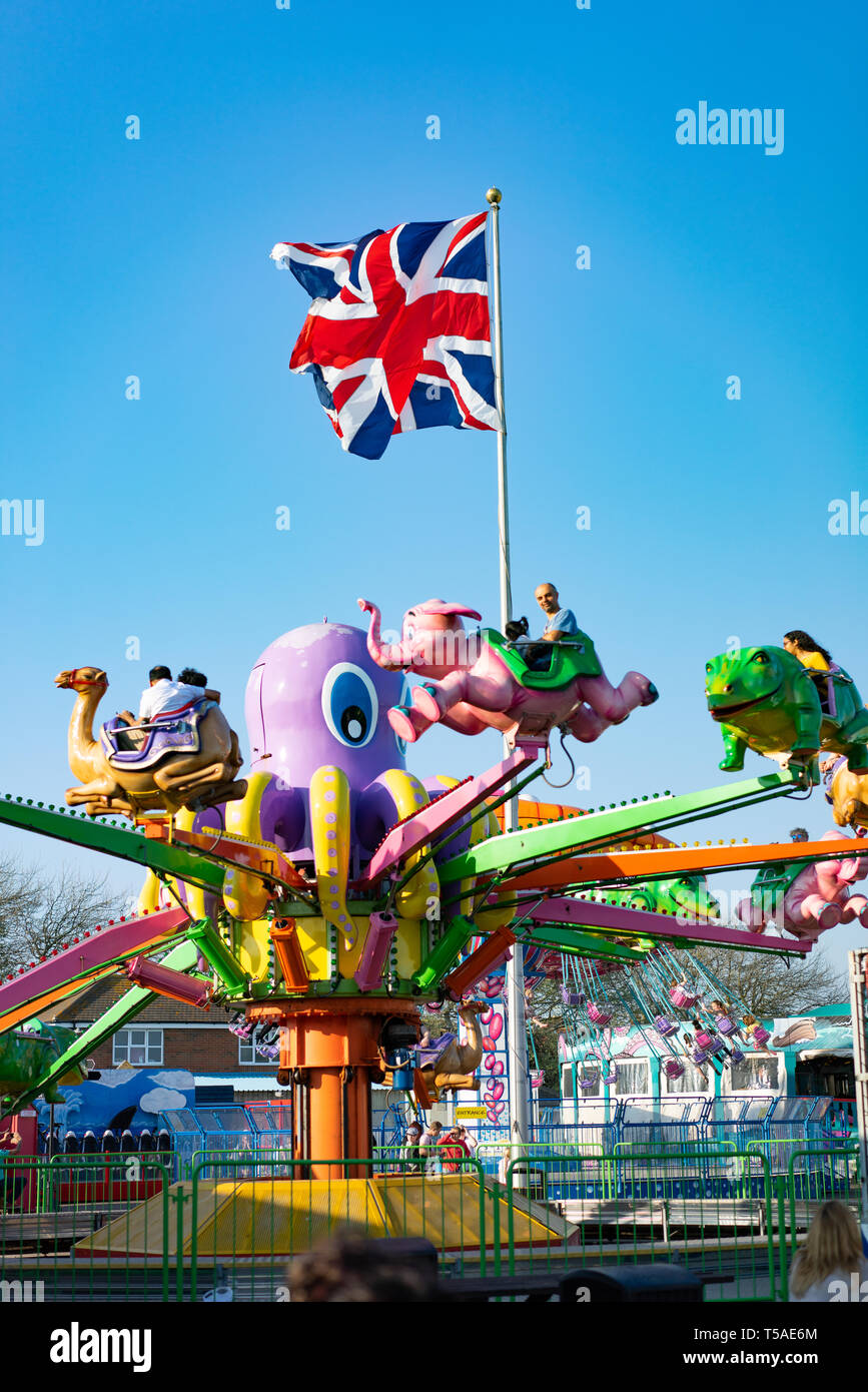 Funfair ride at Littlehampton amusement park in England on a summers ...
