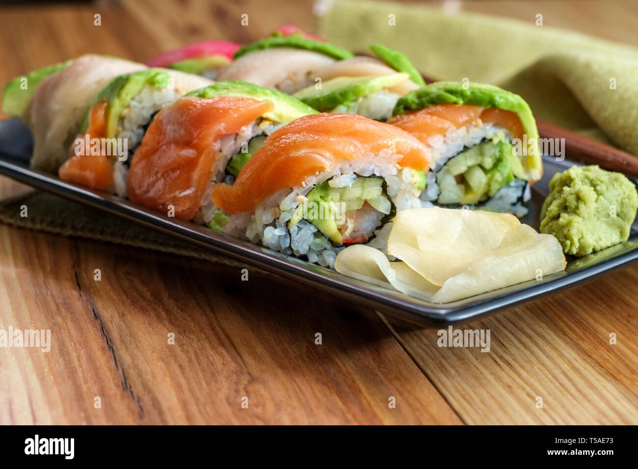 Fresh rainbow sushi roll sliced with wasabi and fresh ginger Stock ...