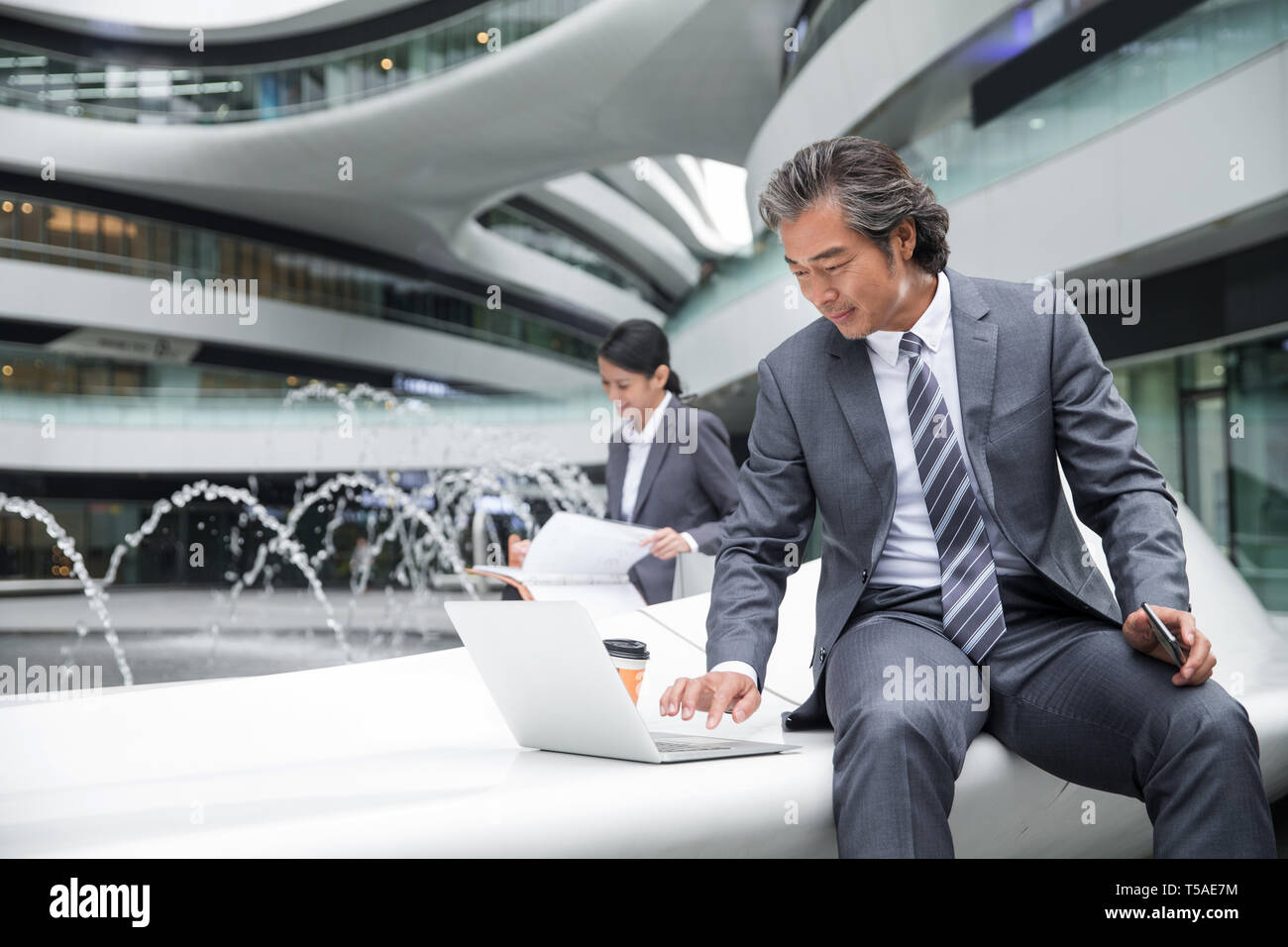 Business people outside the office Stock Photo - Alamy