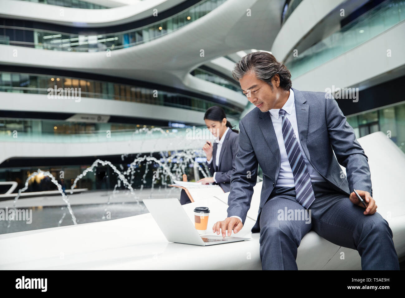 Business people outside the office Stock Photo - Alamy