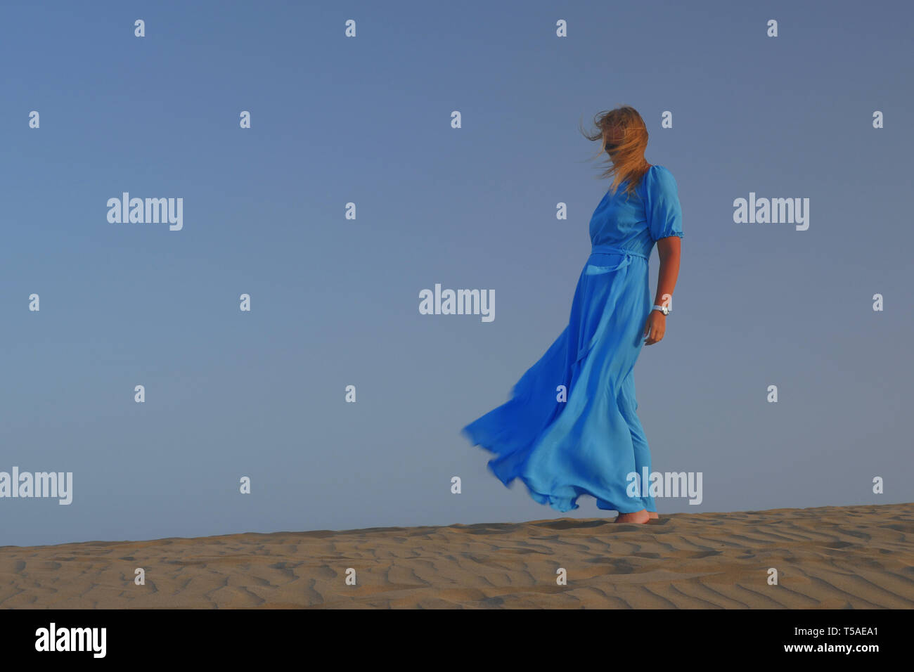 Lady in blue Stock Photo - Alamy