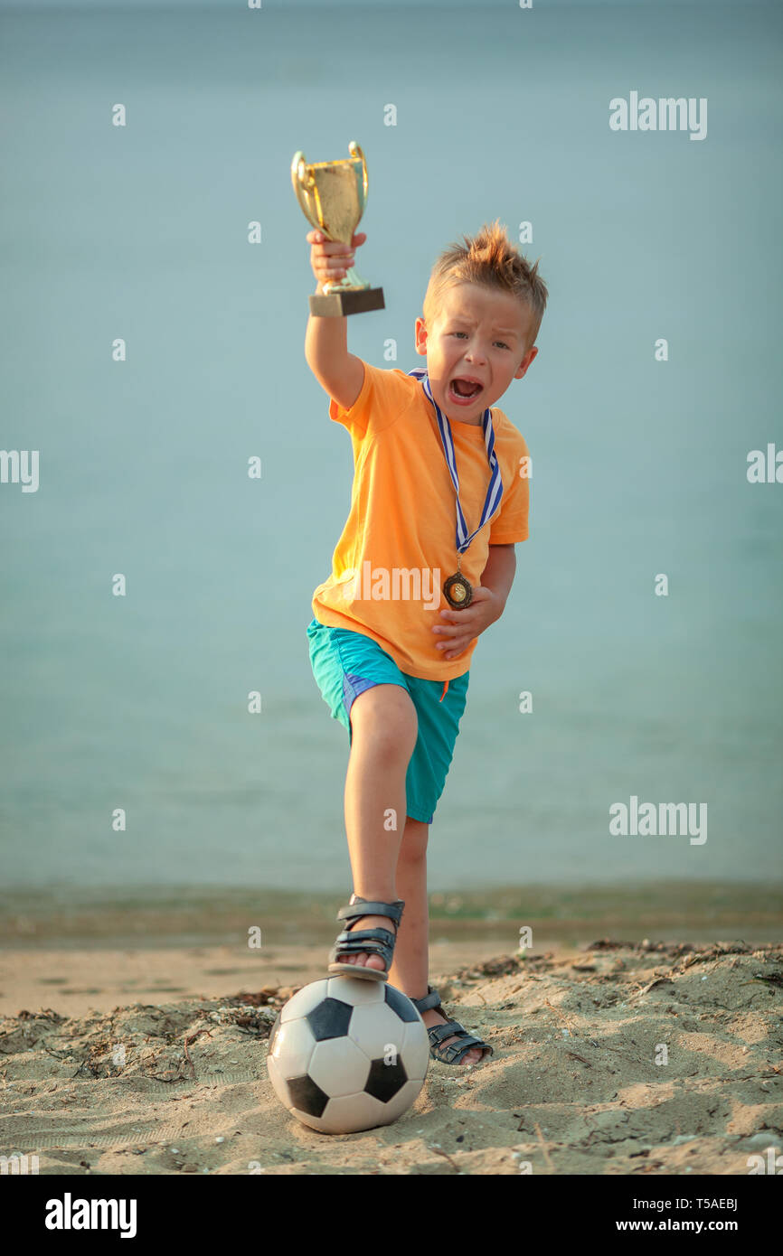 Boy winner medal hi-res stock photography and images - Alamy