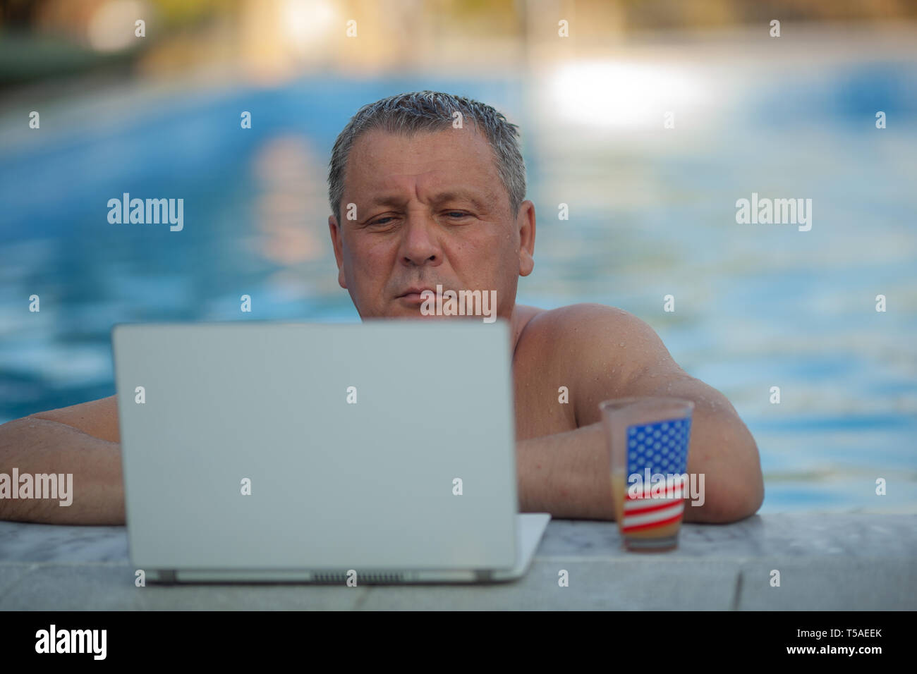 Man getting into pool hi-res stock photography and images - Alamy