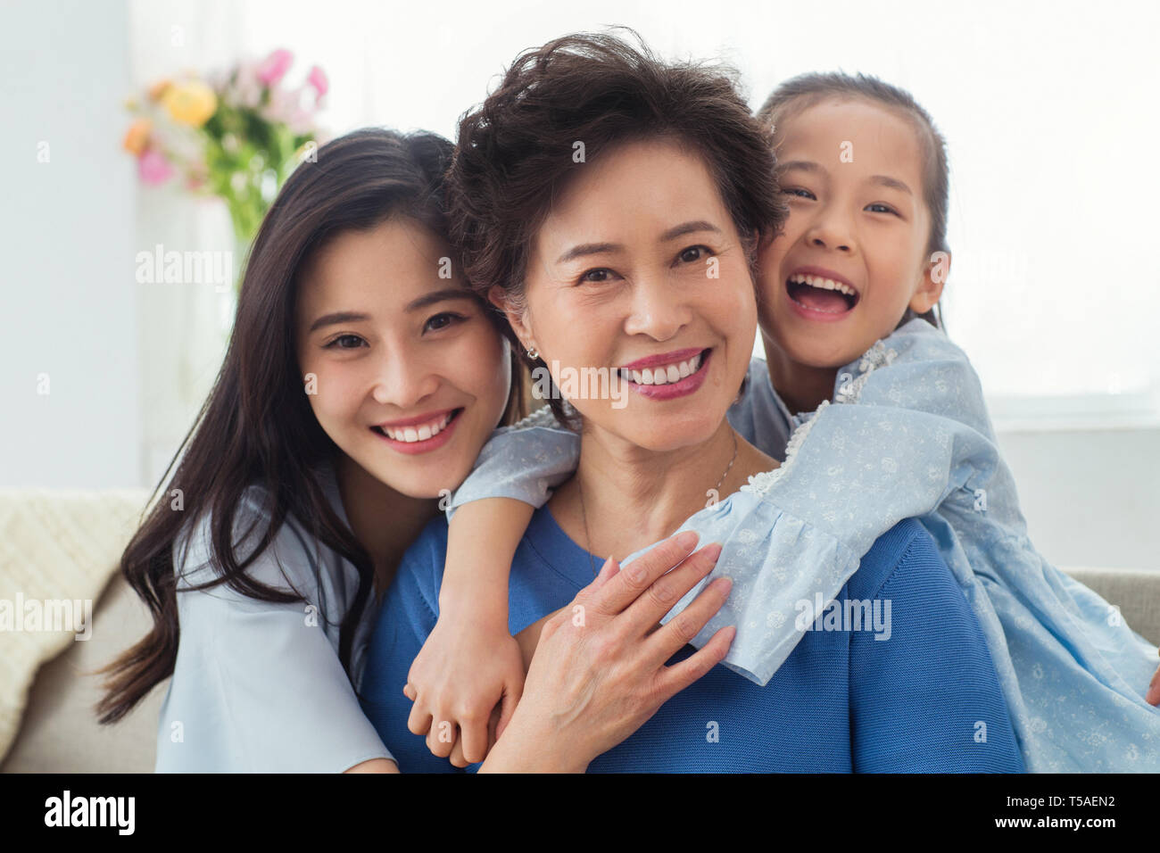 Happy three generations Stock Photo - Alamy