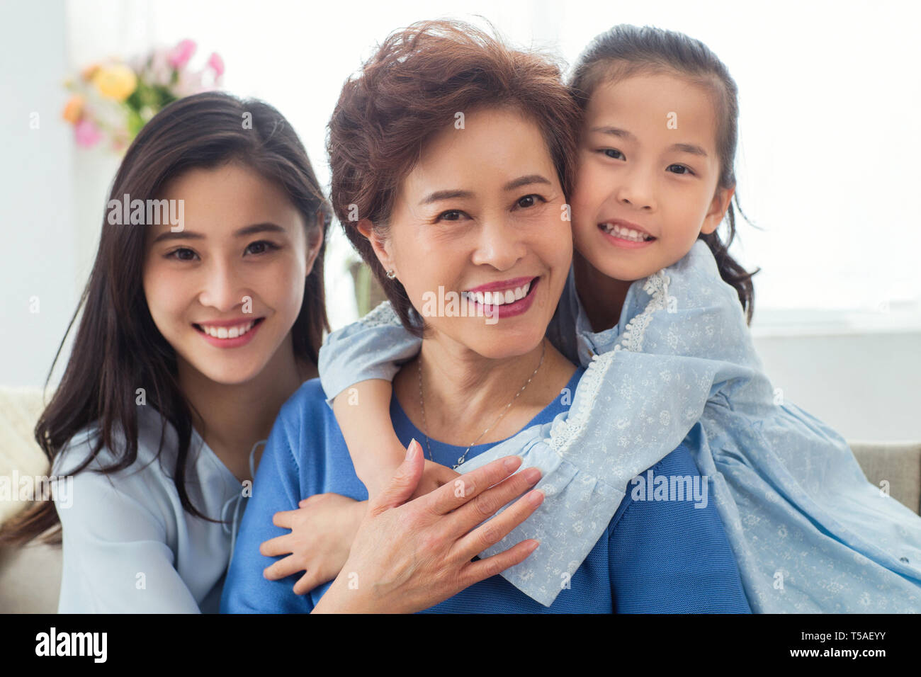 Happy three generations Stock Photo - Alamy