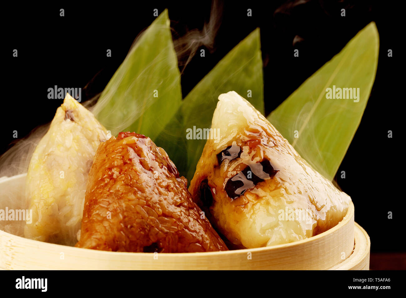 Glutinous Rice Wrapped in Bamboo Leaves Stock Photo - Alamy