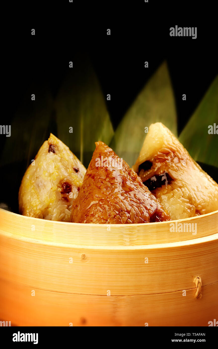 Glutinous Rice Wrapped in Bamboo Leaves Stock Photo - Alamy