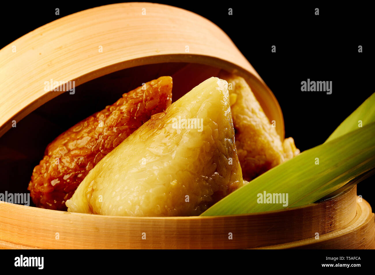 Glutinous Rice Wrapped in Bamboo Leaves Stock Photo - Alamy