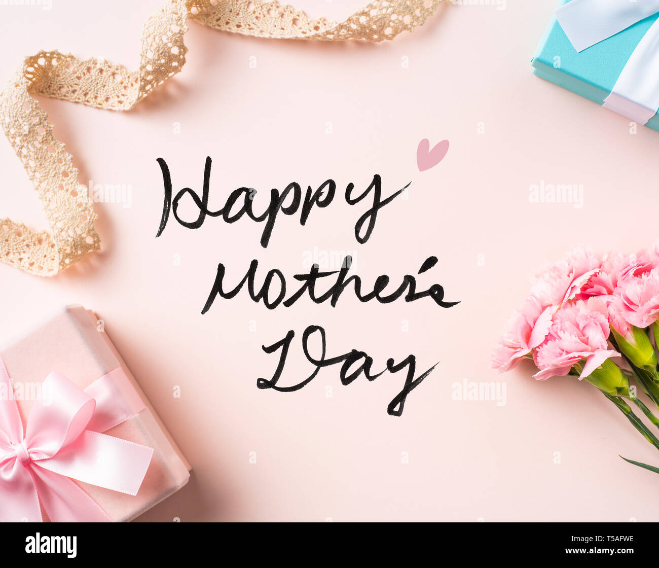 Design concept - top view of a bunch of carnation, gift box, hand ...