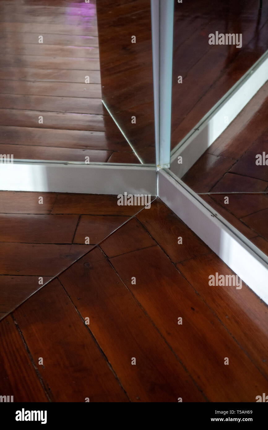 Floor Reflected in Mirrors Stock Photo - Alamy