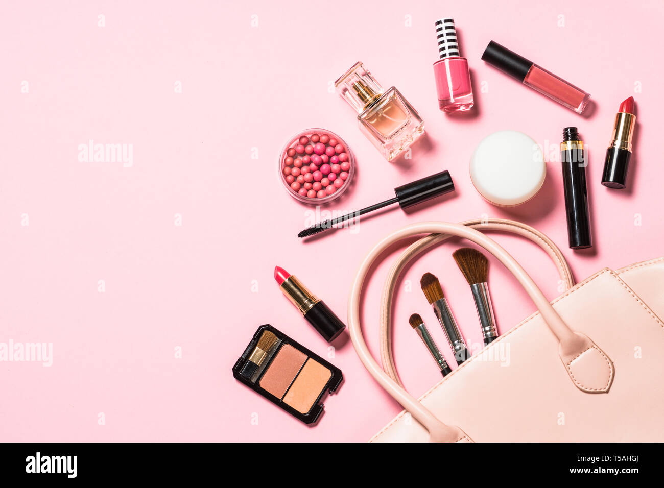 Woman flat lay makup background with cosmetics on pink Stock Photo - Alamy
