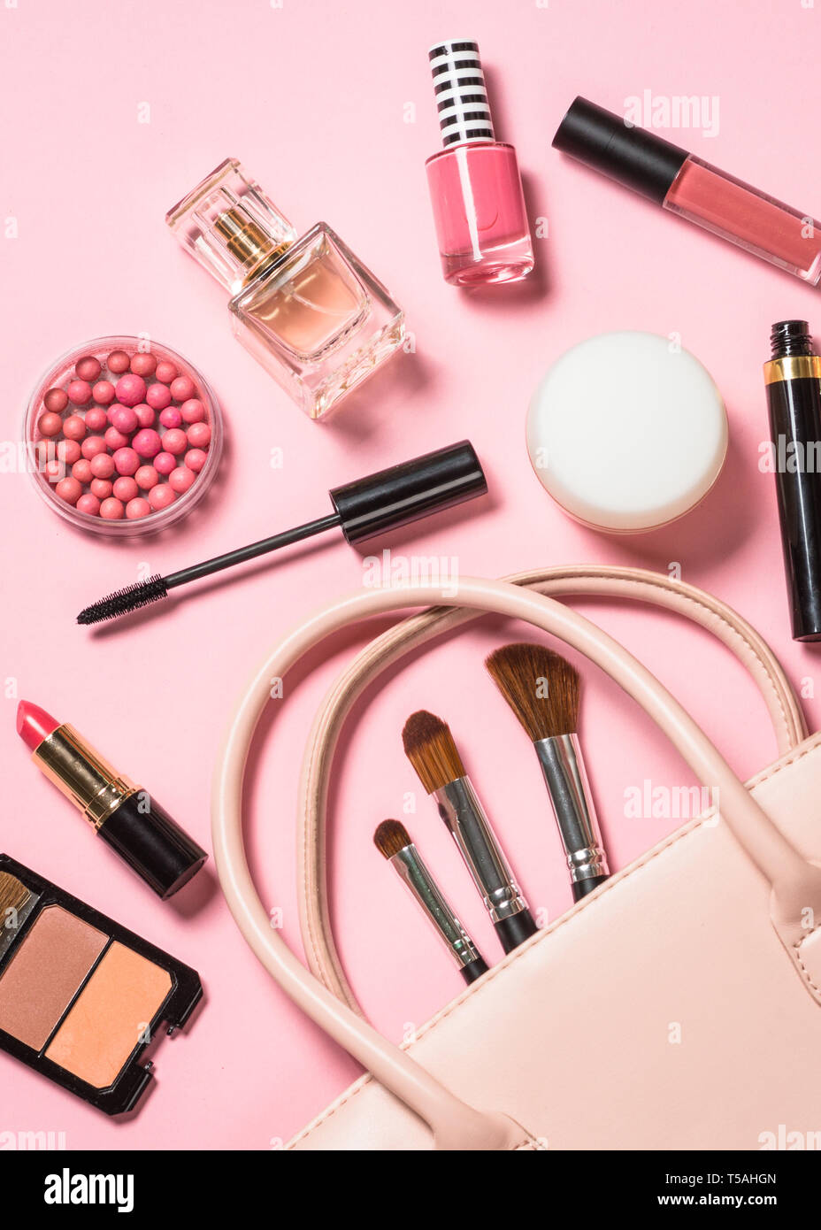 Woman flat lay makup background with cosmetics on pink Stock Photo - Alamy