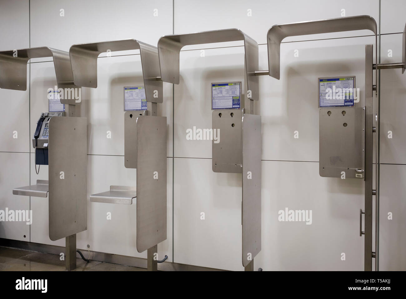 Line of empty public telephone booths Stock Photo - Alamy