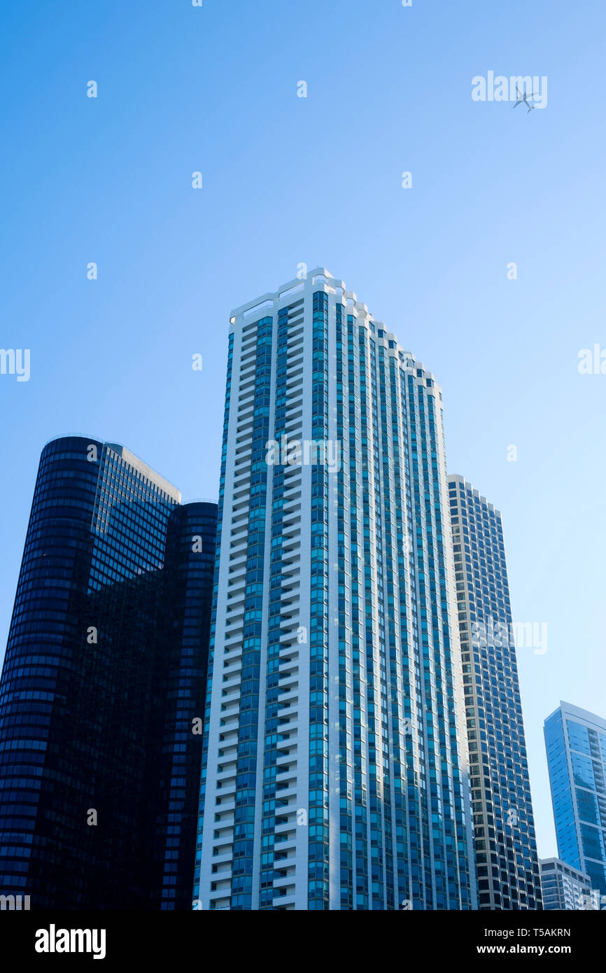 Airplane flying over Downtown Chicago Stock Photo - Alamy
