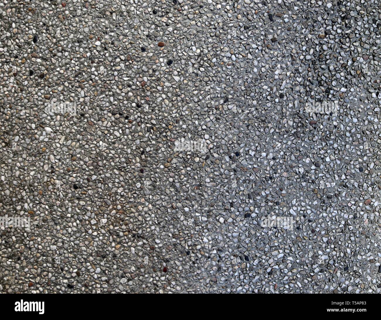 High resolution close up surface texture of gravel on the ground with ...