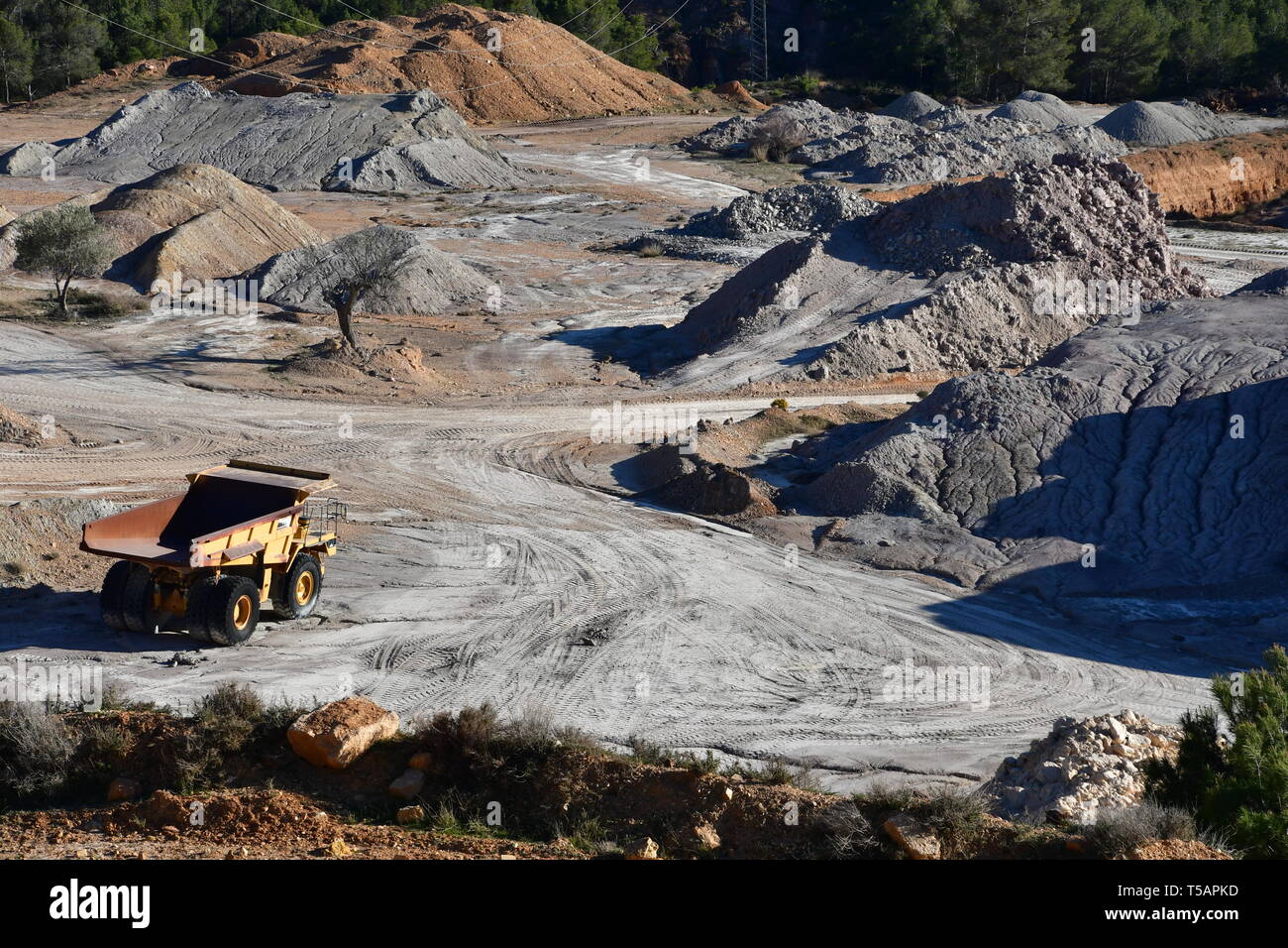 Trucks working in a mining area Stock Photo - Alamy