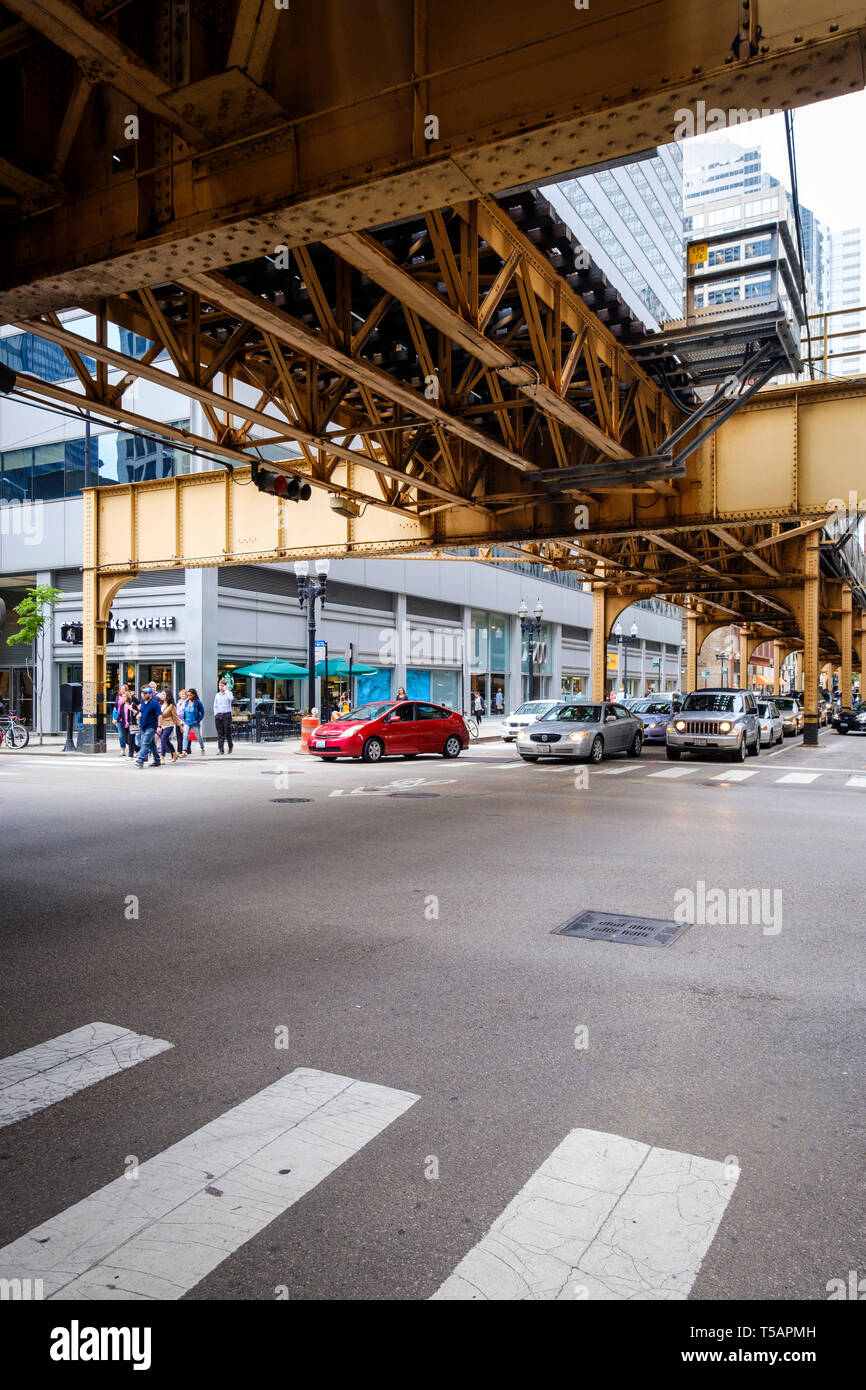 Busy streets under the Loop metro train at Downtown Chicago Stock Photo ...