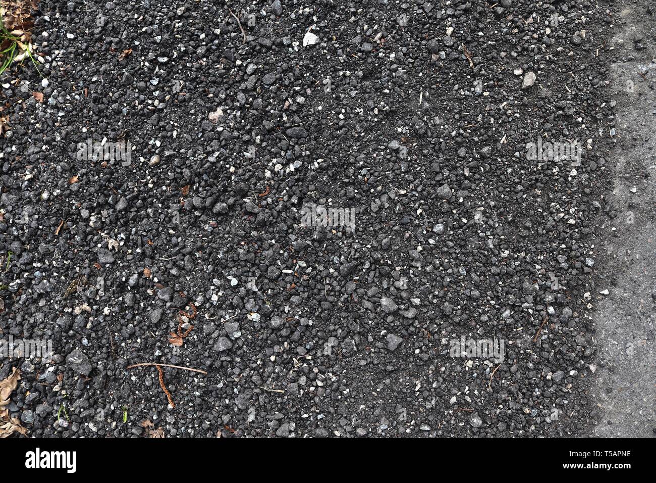 High resolution close up surface texture of gravel on the ground with ...
