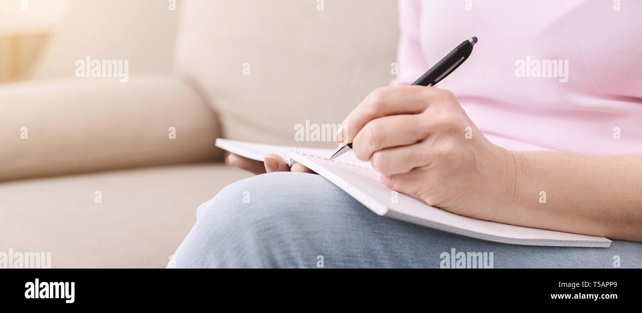 Lady noting pen in copybook hi-res stock photography and images - Alamy