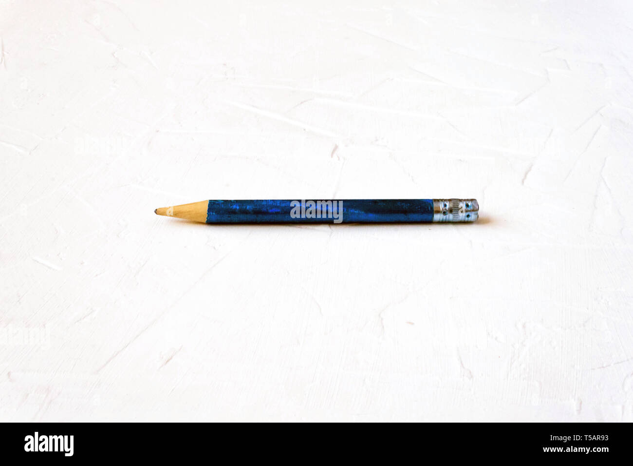 Single used worn pencil with eraser isolated on white background ...