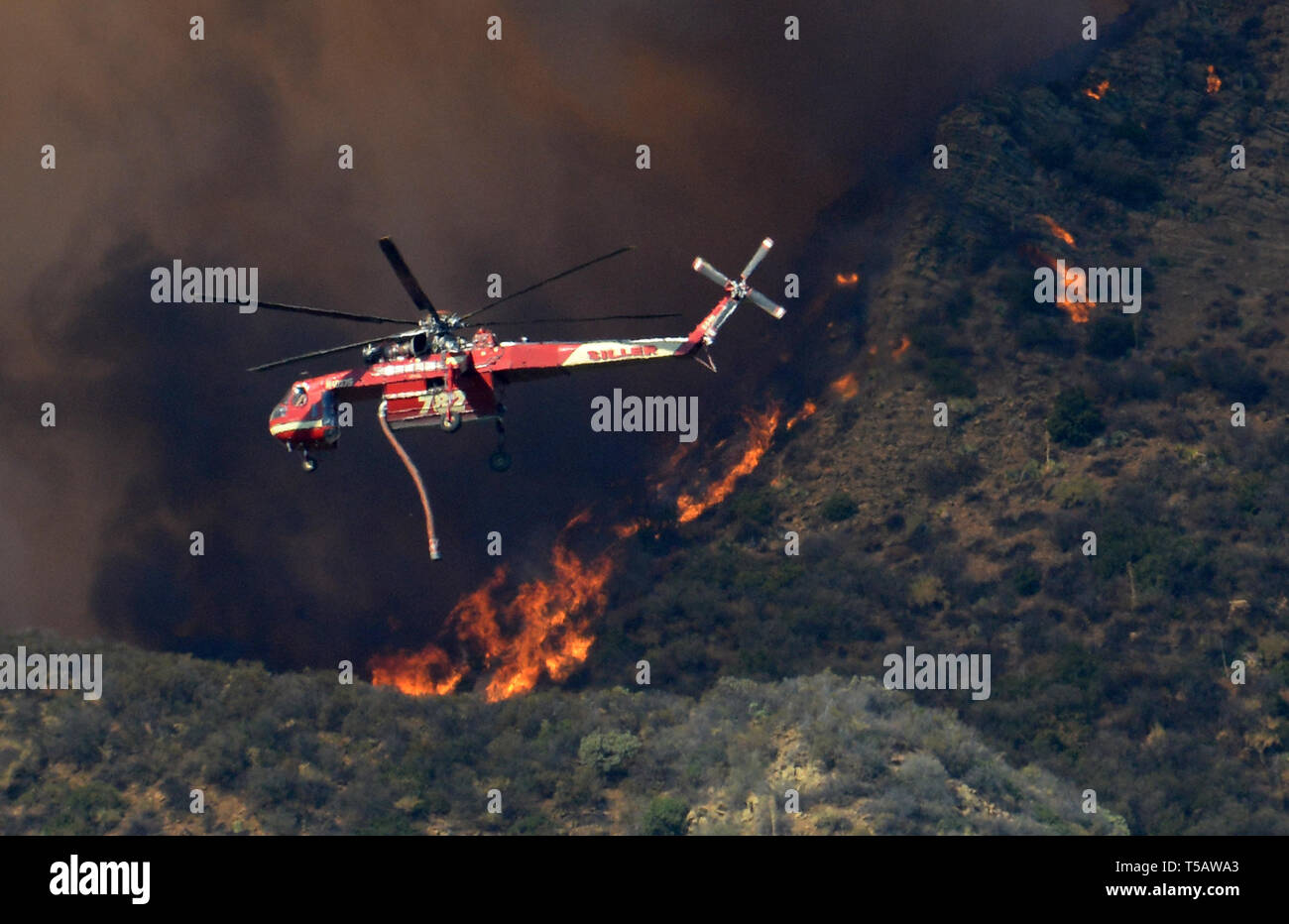 Santa Ynez, CA, USA. 21st Aug, 2016. A skycrane helicopter moves into ...