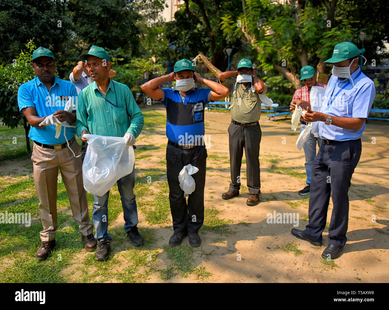 People Cleaning The Earth